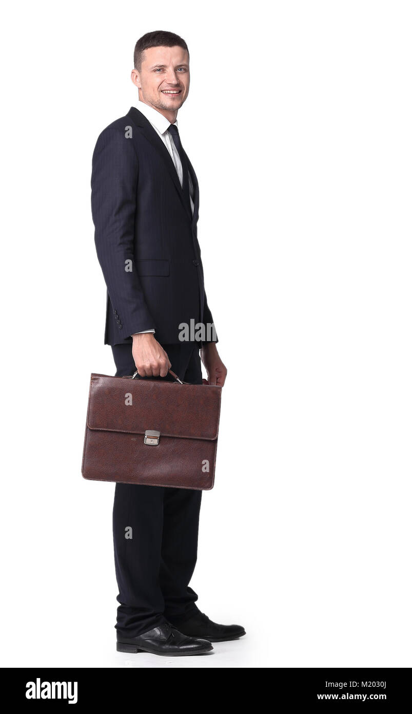 confident businessman with briefcase. side view Stock Photo - Alamy