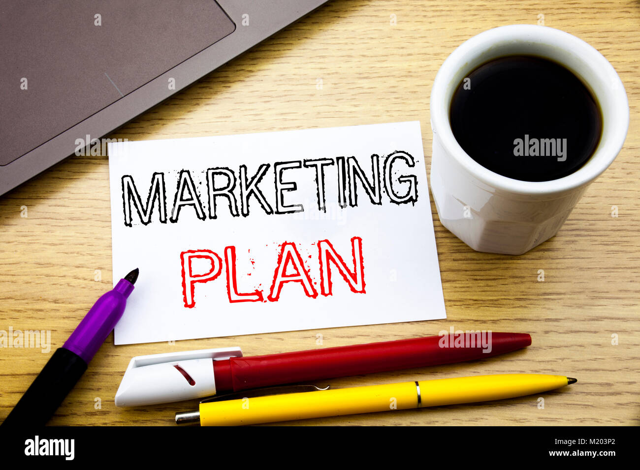 Handwritten text caption showing Marketing Plan. Business concept ...