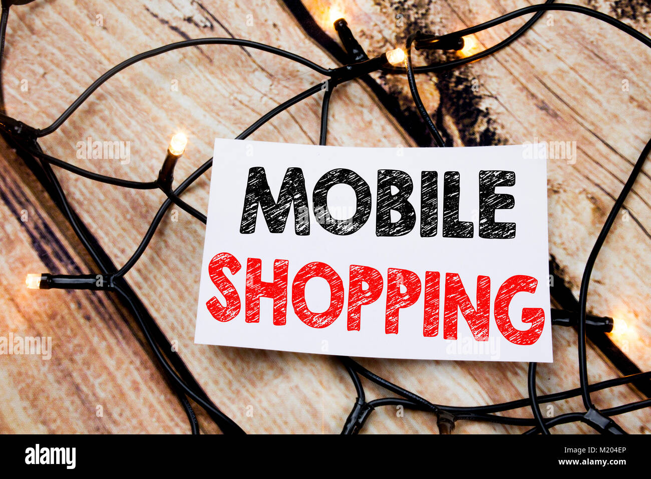 Handwritten text caption showing Mobile Shopping. Business concept ...