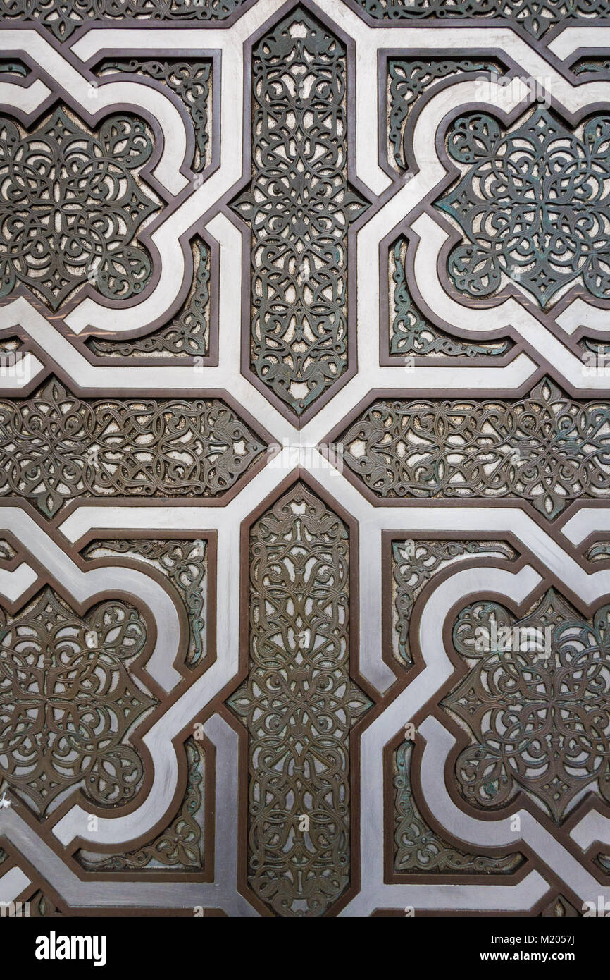 full frame shot of a traditional mosque gate decorated with a moroccan ...