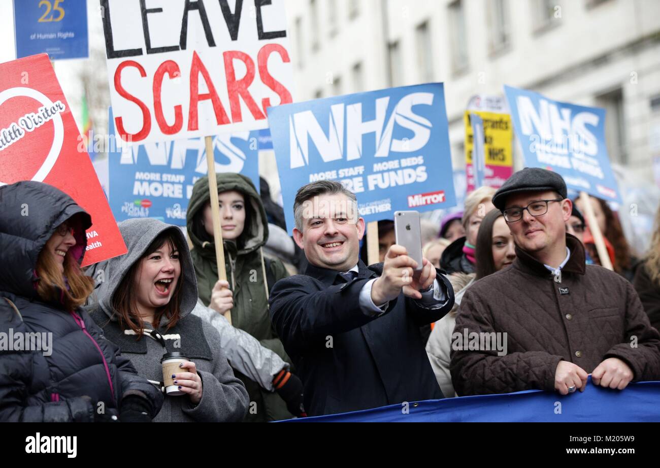 Shadow Health Secretary Jon Ashworth MP (centre) joins with people ...