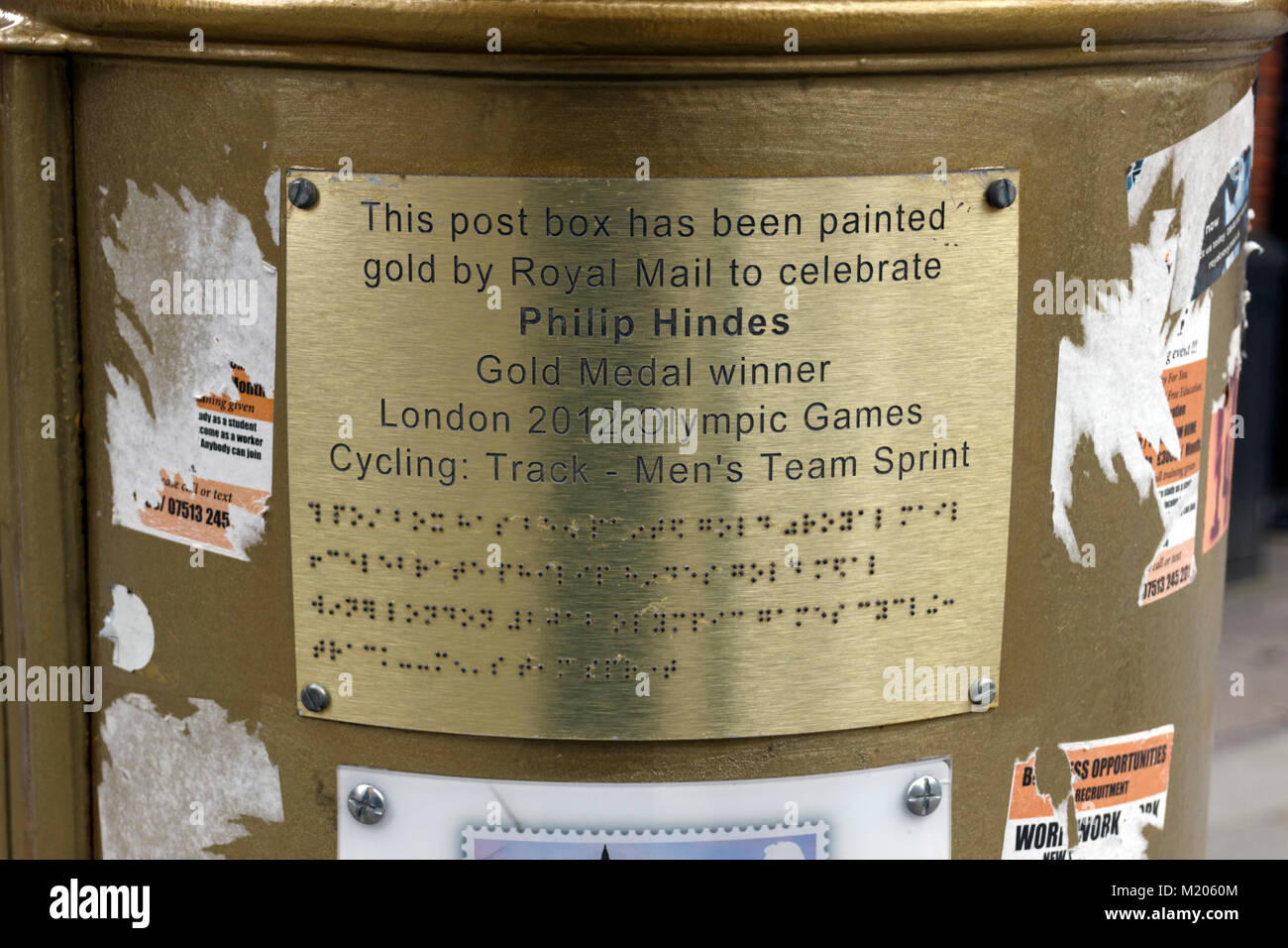 Post box in Manchester, painted in gold to celebrate 2012 Olympic Gold ...