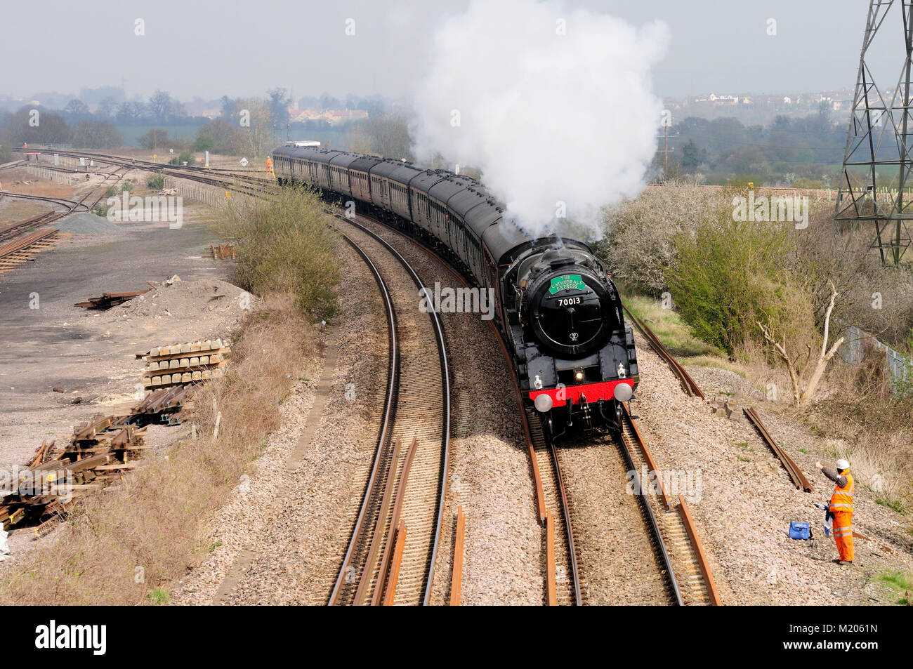 The track maintenance lookout gives a thumbs up to No 70013 'Oliver ...