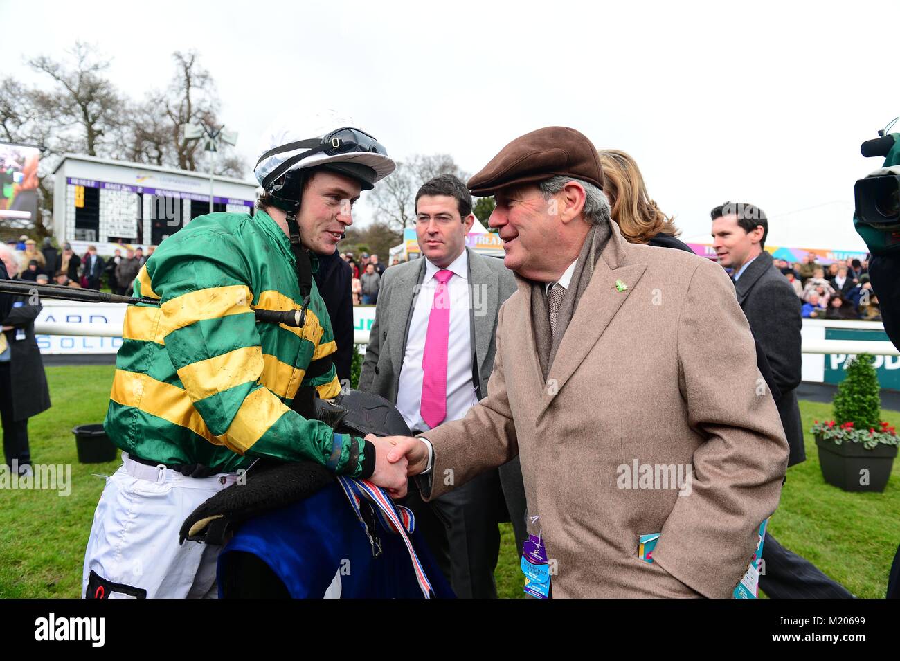 J J Slevin with owner JP McManus after winning the Nathaniel Lacy ...