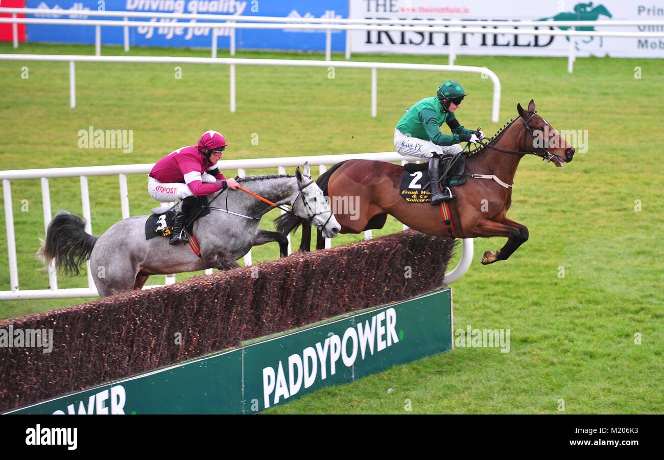 Footpad (right) ridden by Paul Townend jump the last to win the Arkle ...