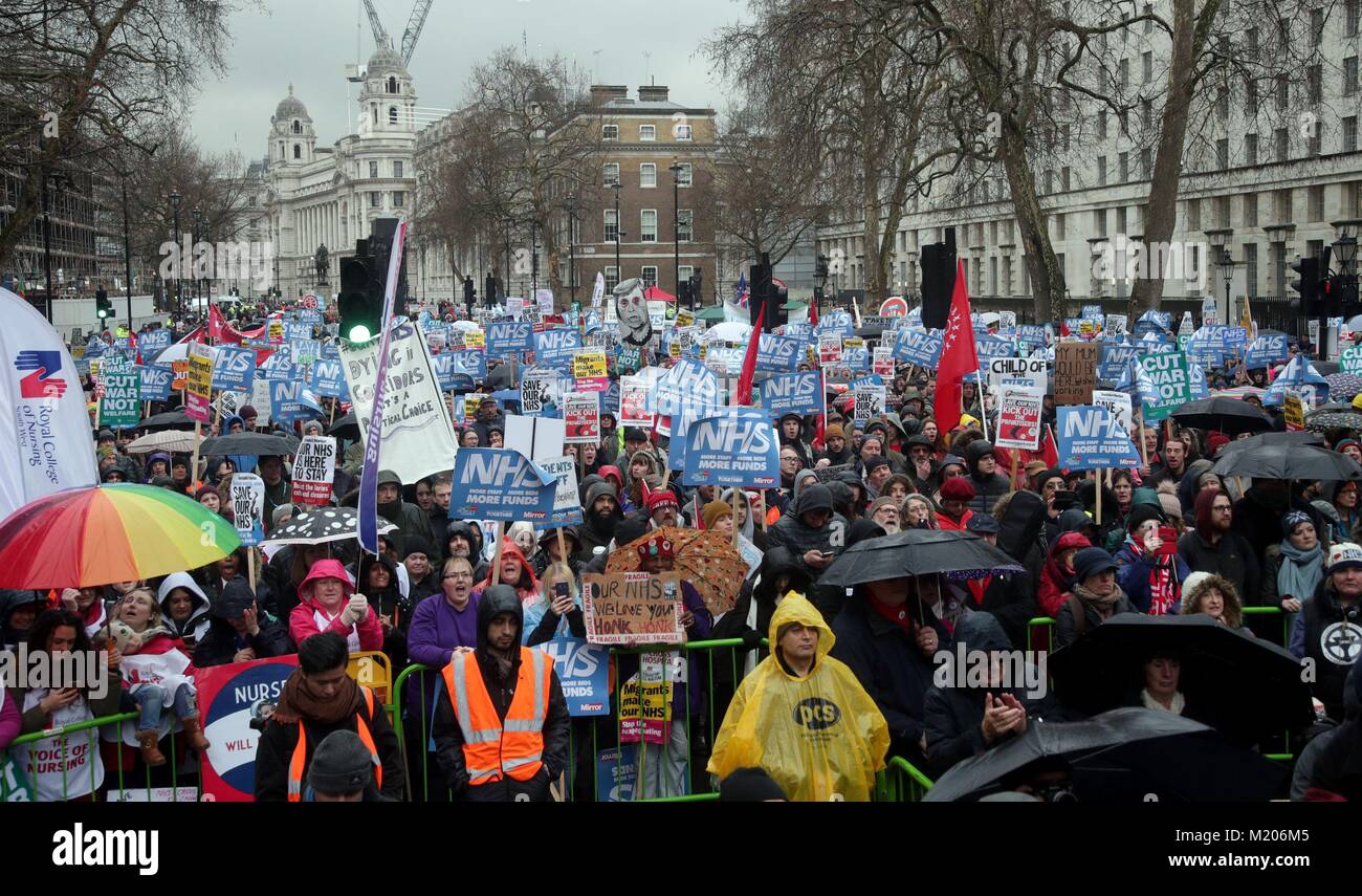 People take part in a march in London in support of the National Health ...