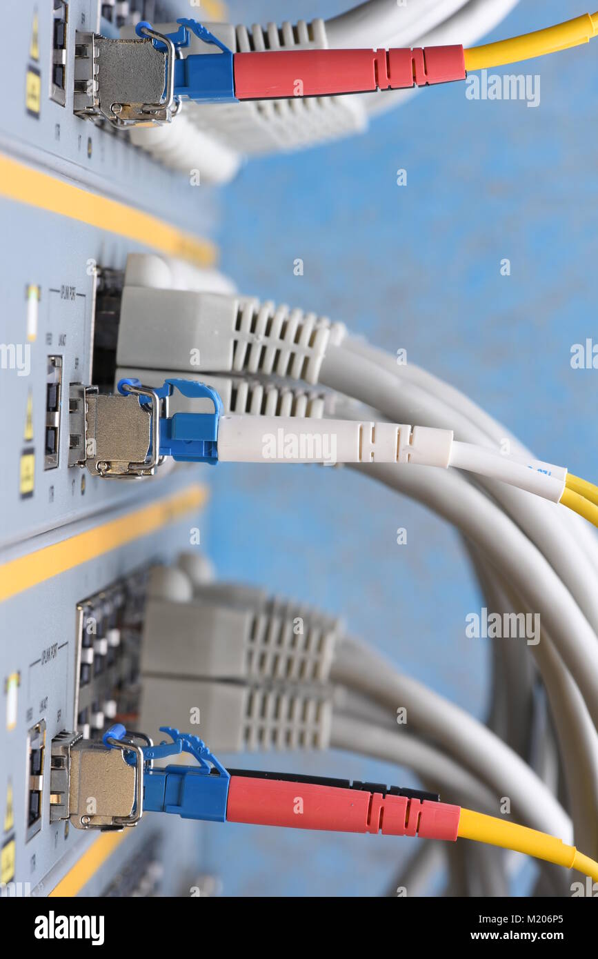 Network cable connected to network switch in data center Stock Photo ...