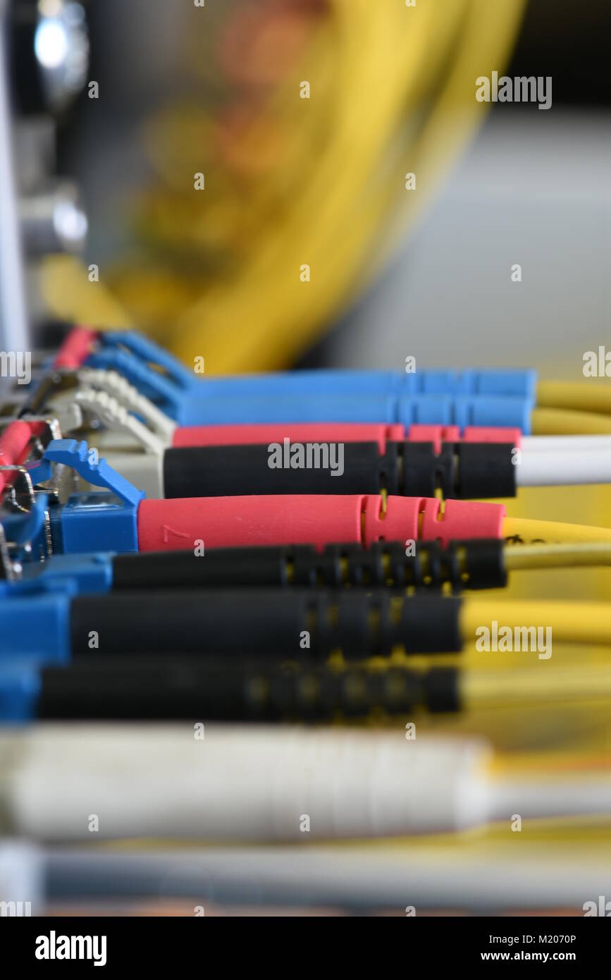 Fiber optical patch cord cable connected to switch in data center Stock ...
