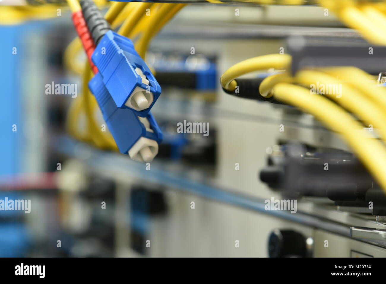 Network devices and optical cables in telecommunication system Stock ...