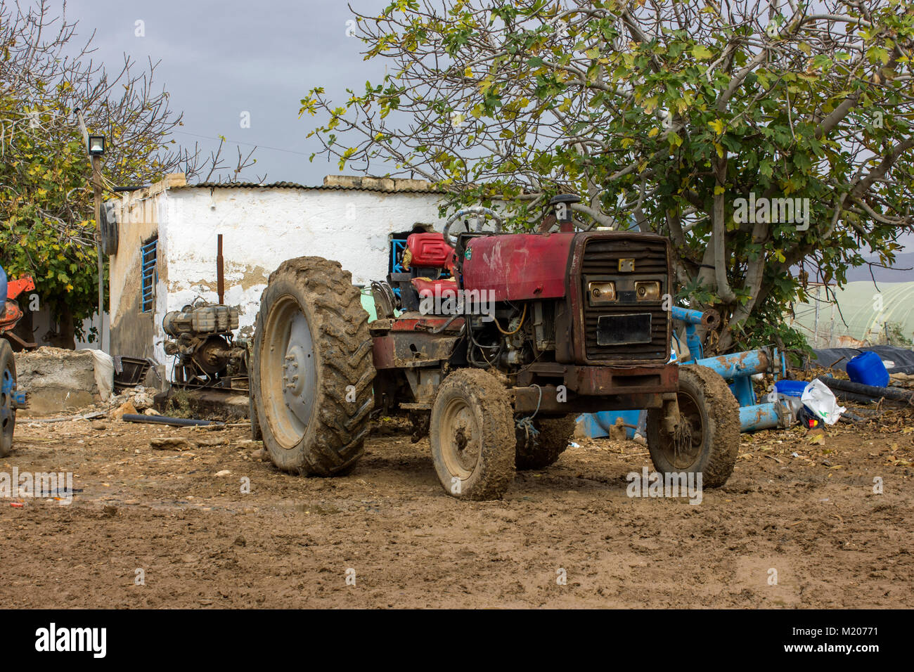 Antique tractor rustic rusty metal machine Stock Photo - Alamy