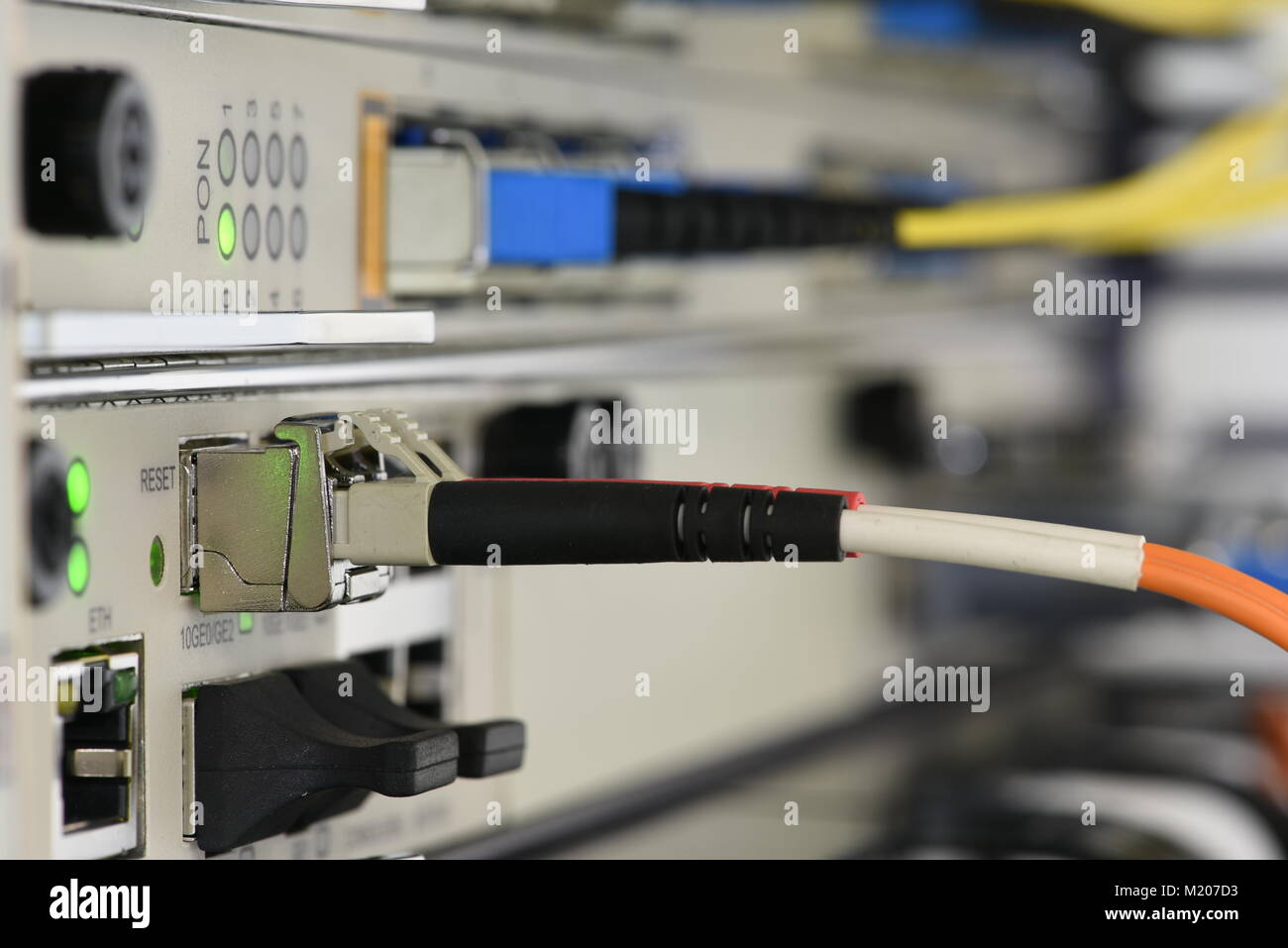 Optical network cables and devices in technology data center Stock ...