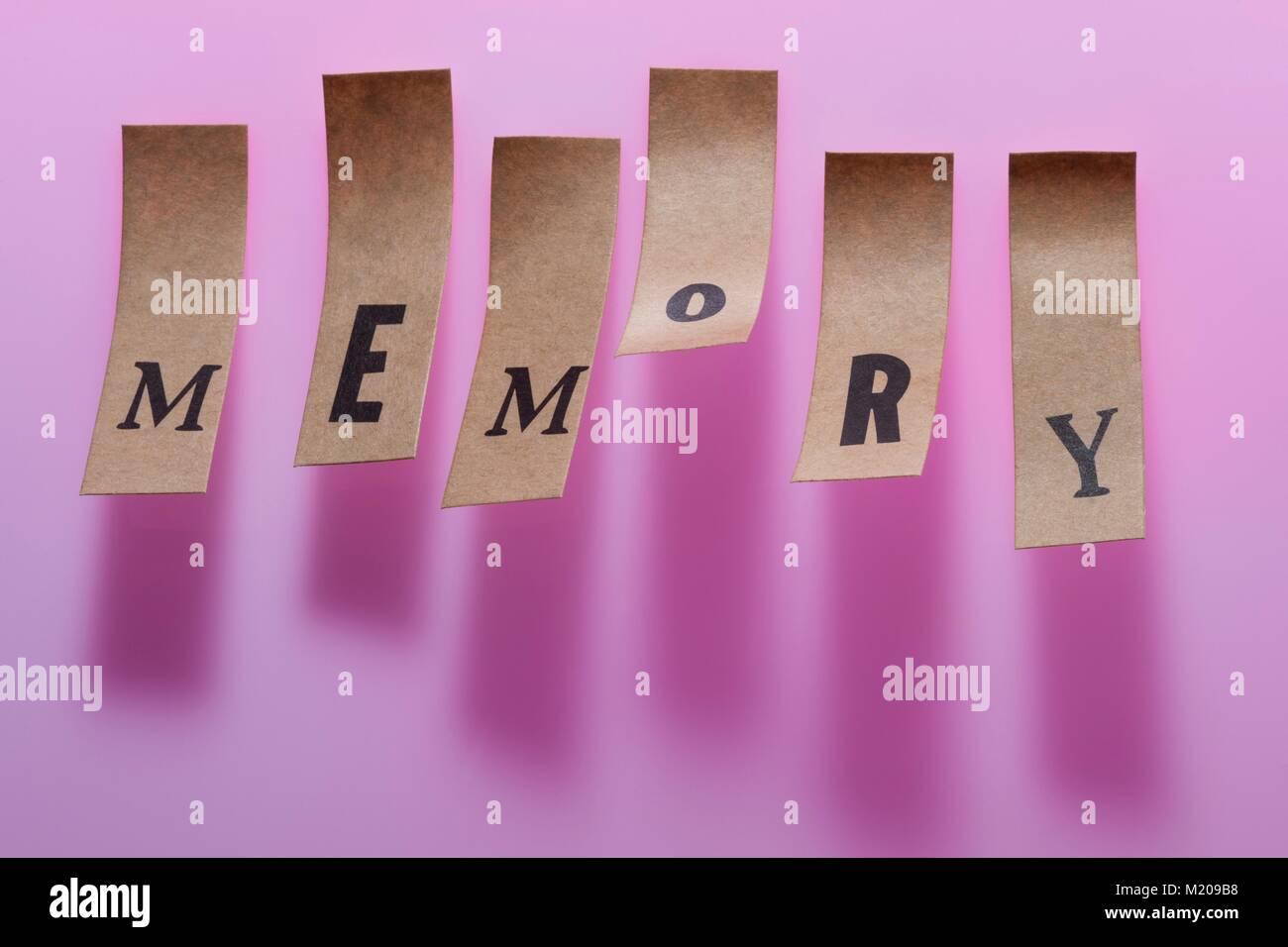 Pieces of paper with the word memory, studio shot Stock Photo - Alamy