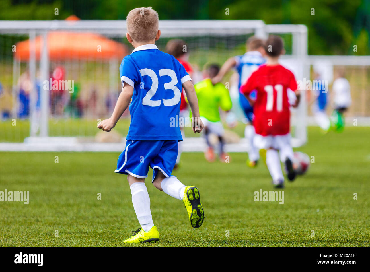 Footballers in background hi-res stock photography and images - Alamy