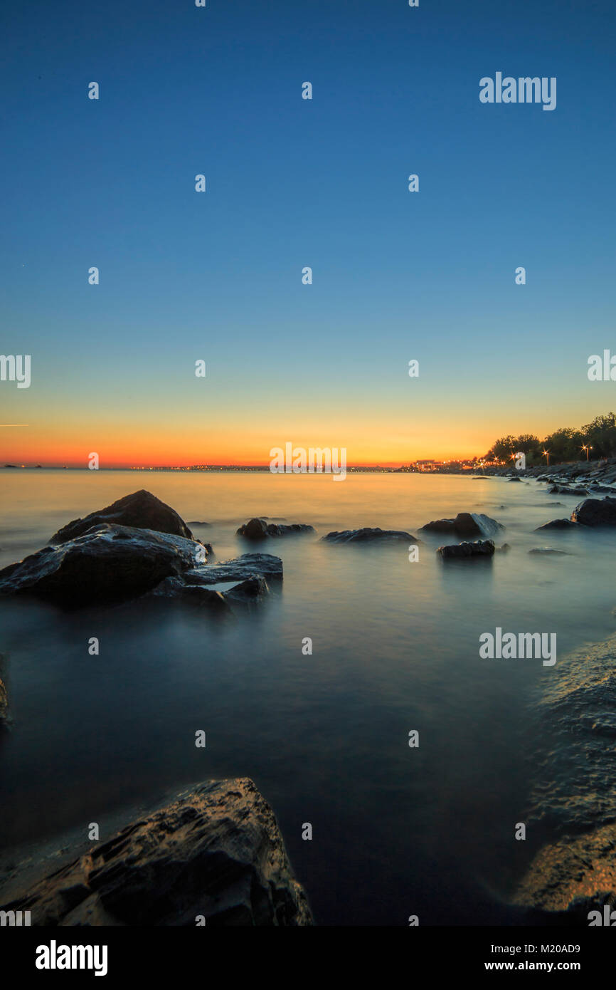 Empty sea and rocks During the sunset with Silky Sea beacuse of the ...
