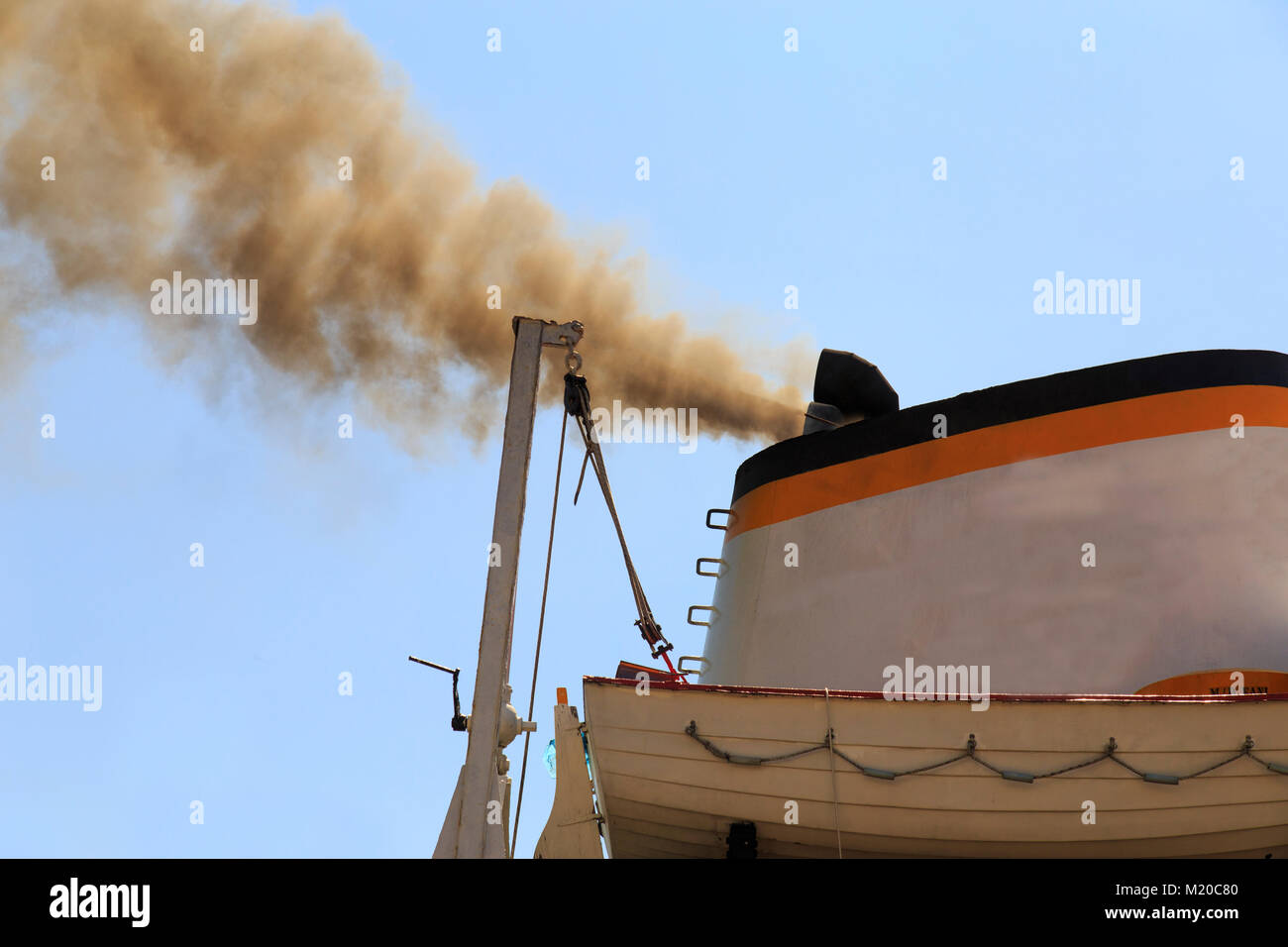 exhaust of ferry cause to air pollution Stock Photo - Alamy