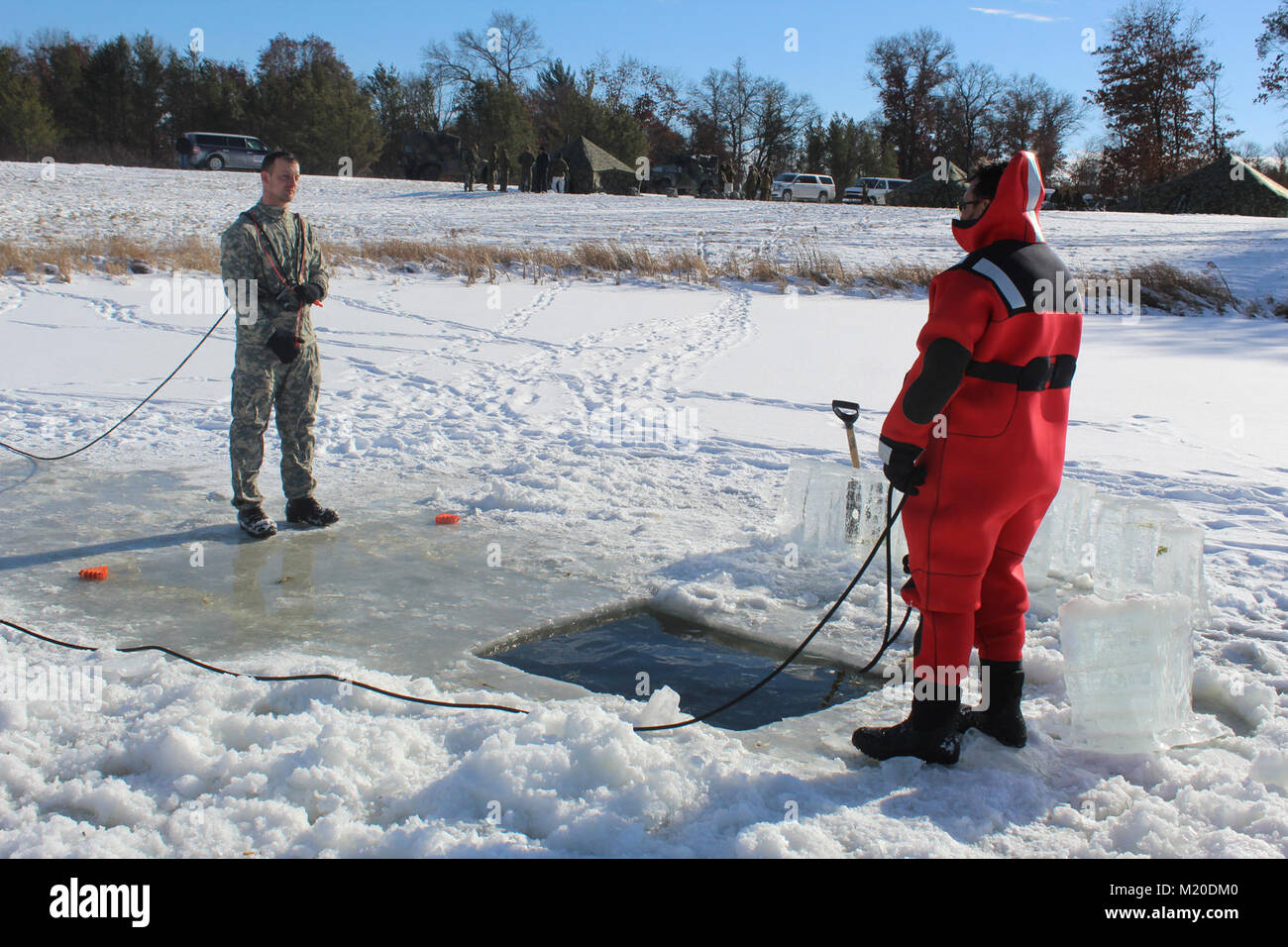 A Soldier participates in cold-water immersion training at an ice ...