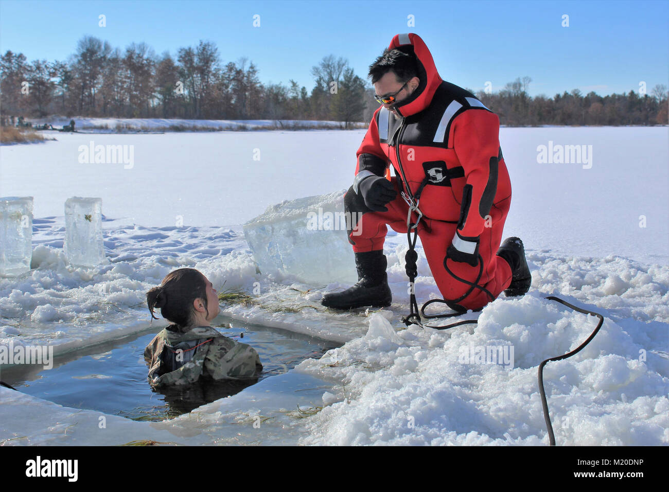 A Soldier participates in cold-water immersion training at an ice ...