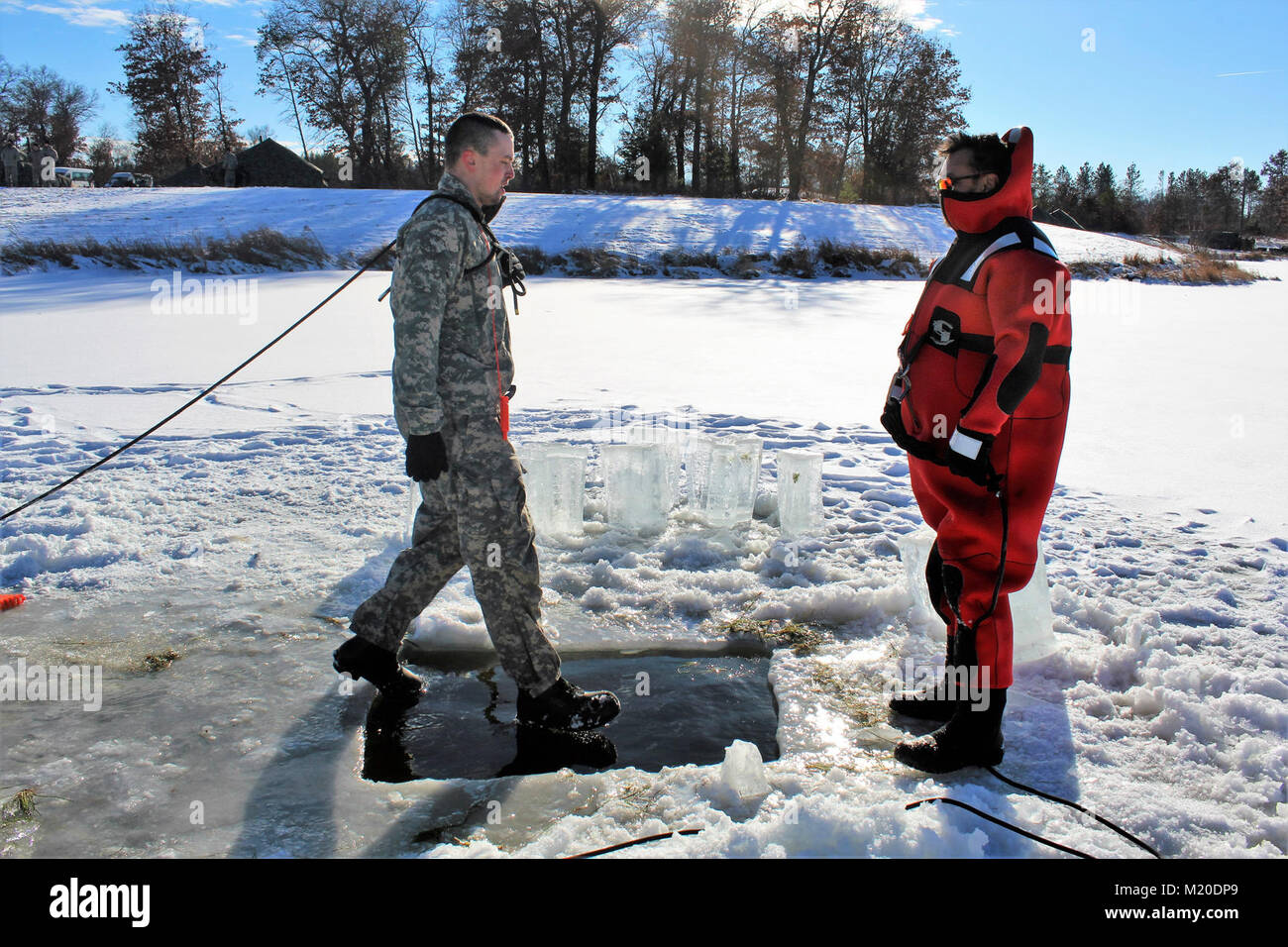 A Soldier participates in cold-water immersion training at an ice ...