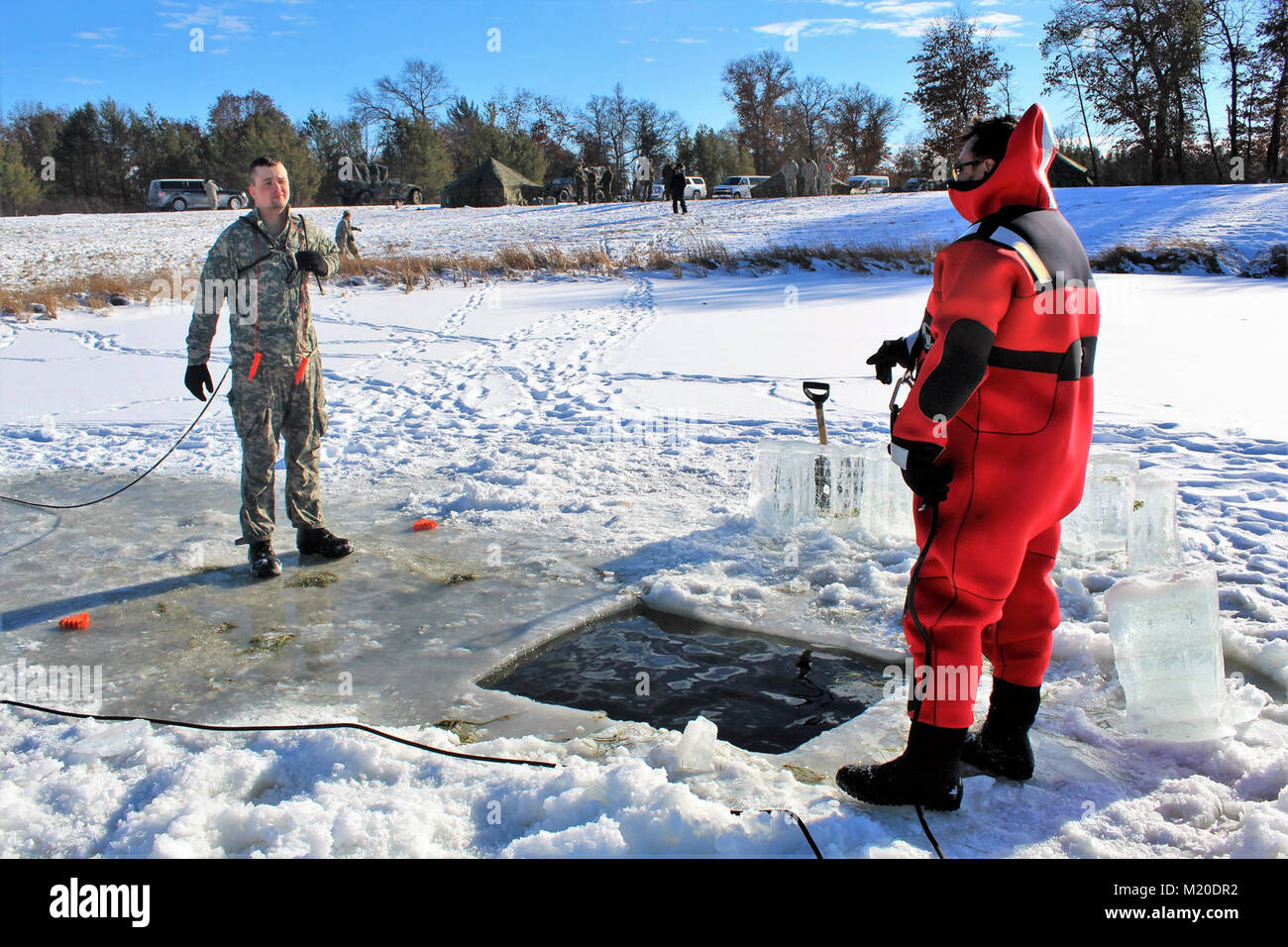 A Soldier participates in cold-water immersion training at an ice ...
