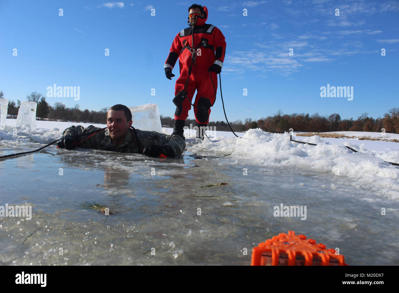 A Soldier participates in cold-water immersion training at an ice ...