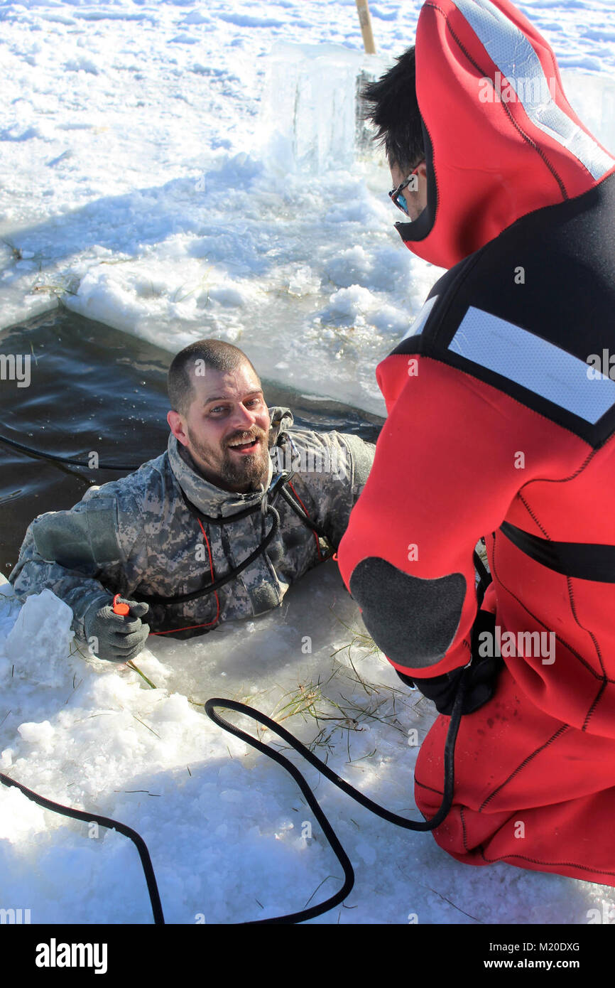 A Soldier participates in cold-water immersion training at an ice ...