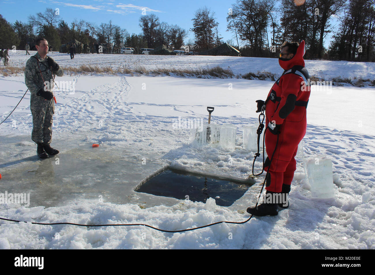 A Soldier participates in cold-water immersion training at an ice ...
