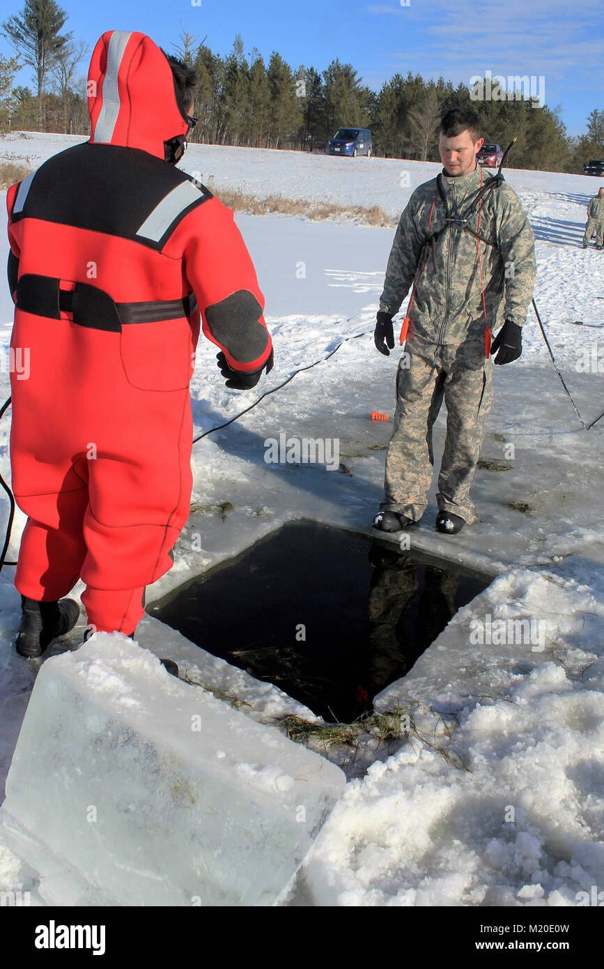 A Soldier participates in cold-water immersion training at an ice ...