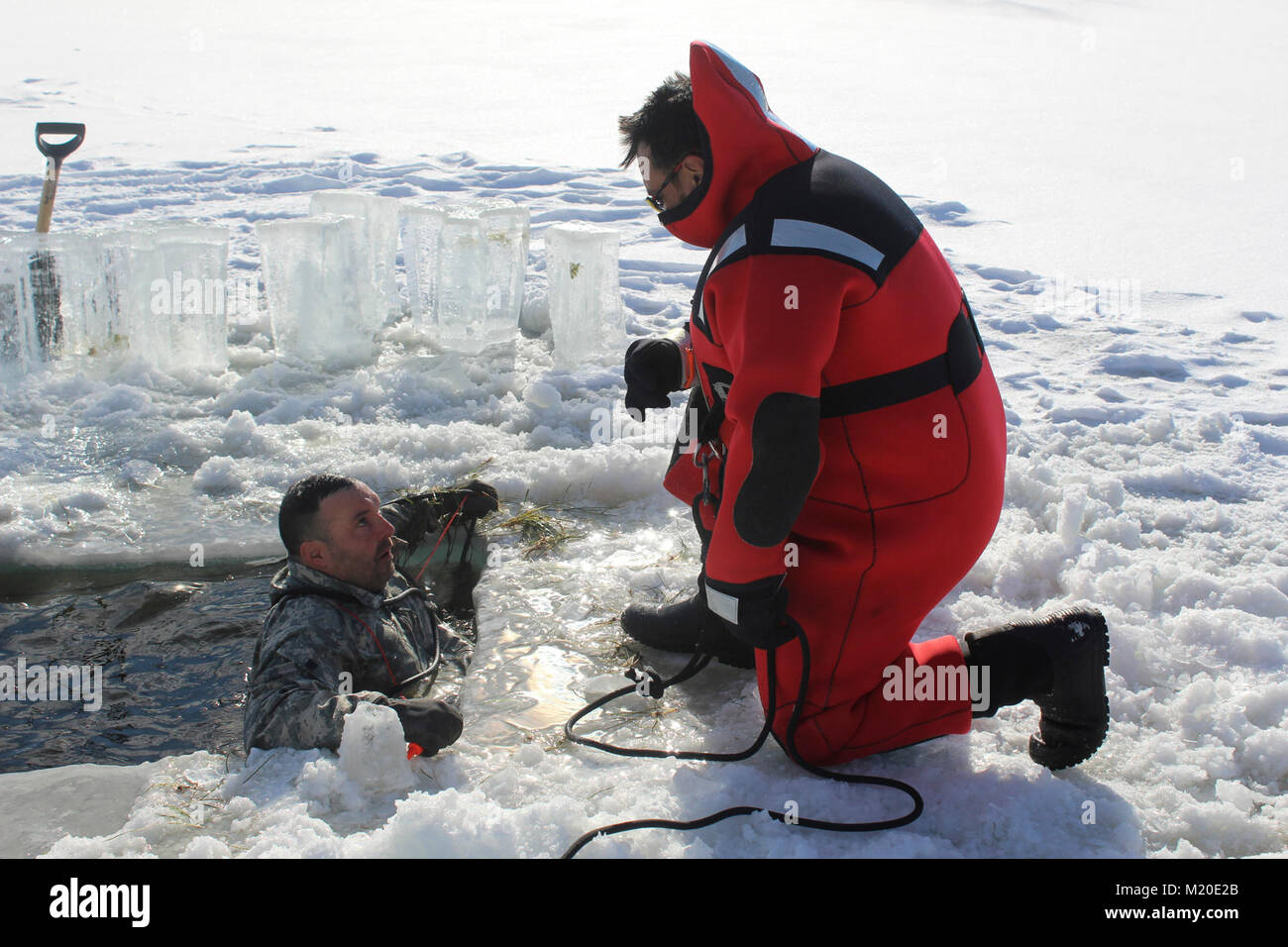 A Soldier participates in cold-water immersion training at an ice ...