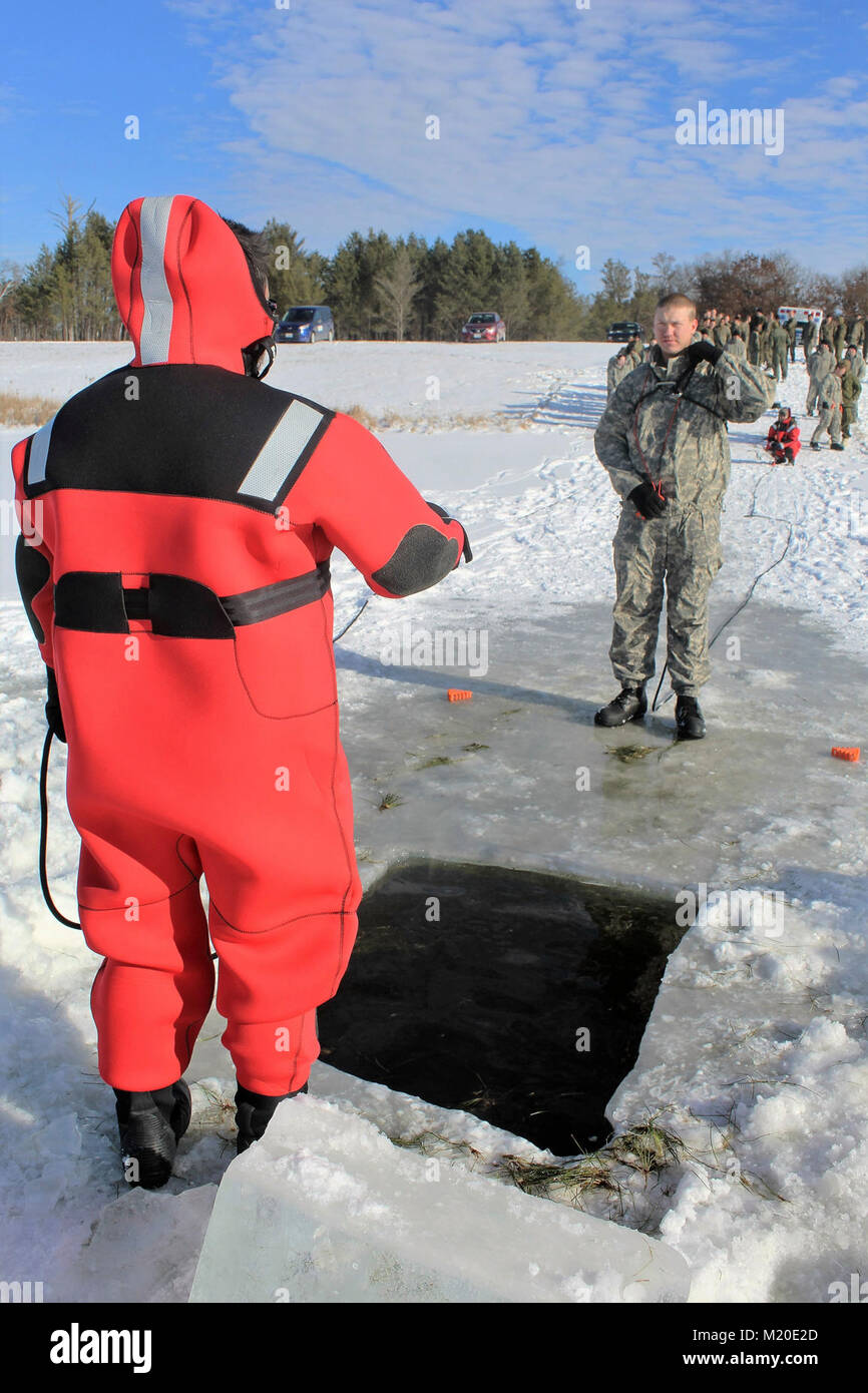 A Soldier participates in cold-water immersion training at an ice ...