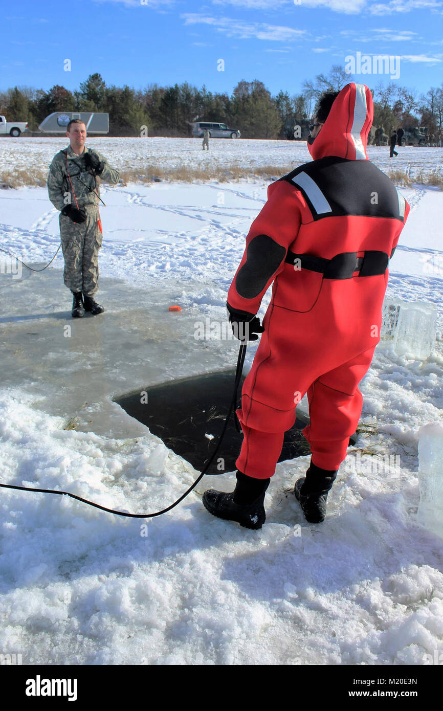 A Soldier participates in cold-water immersion training at an ice ...