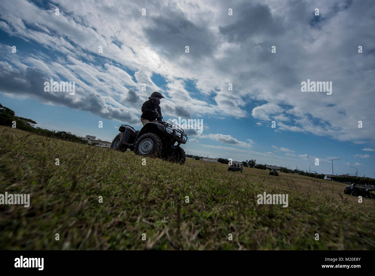 A U.S. Air Force Airman from the 18th Security Forces Squadron rides an ...