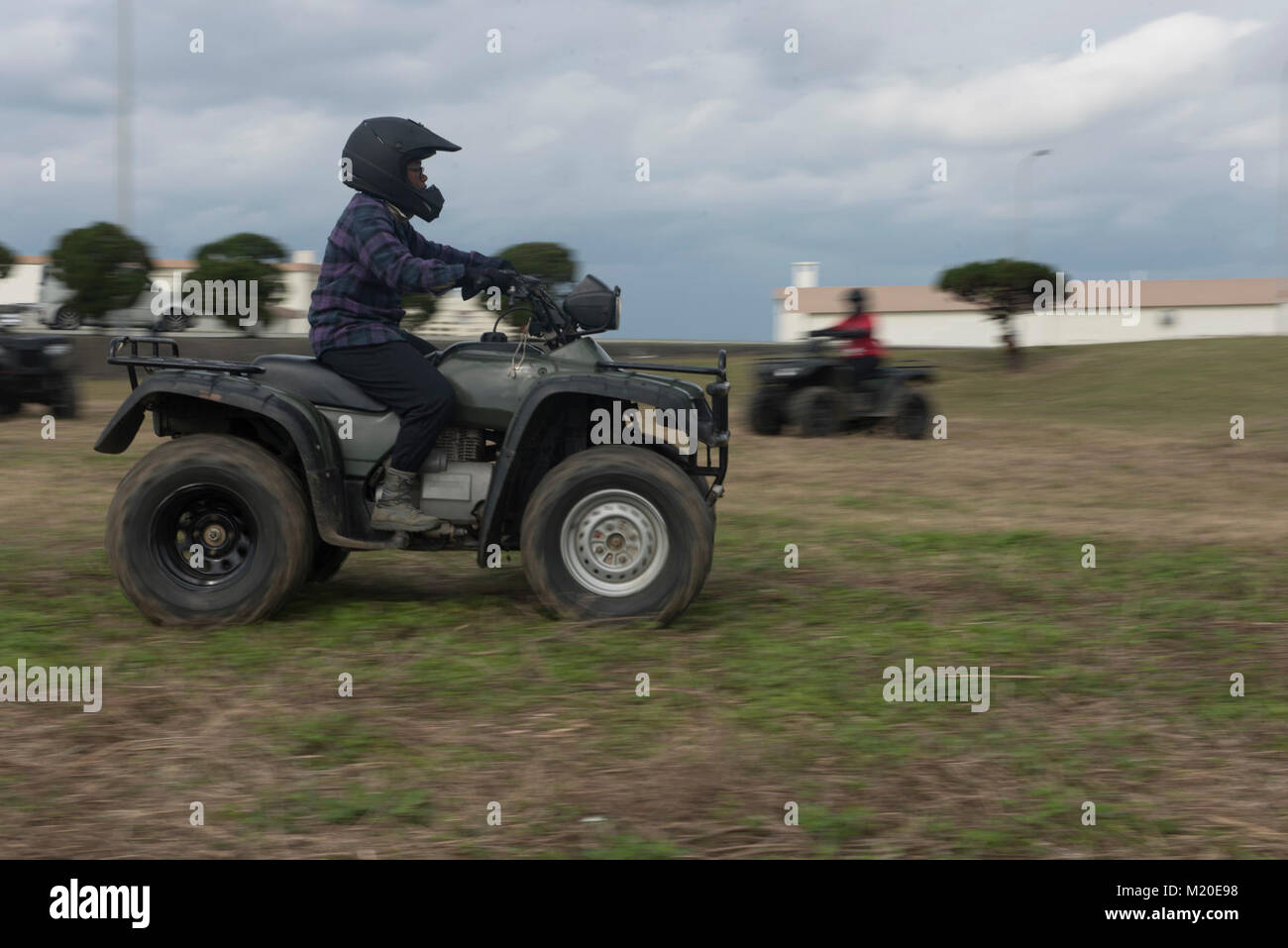 A U.S. Air Force Airman from the 18th Security Forces Squadron rides an ...