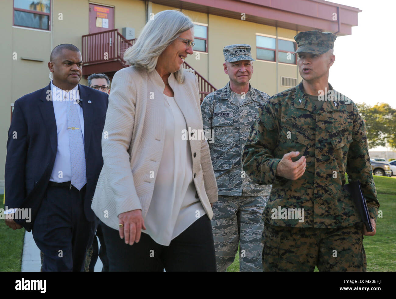 The Honorable Susan M. Gordon, left, speaks with Col. John Walker ...