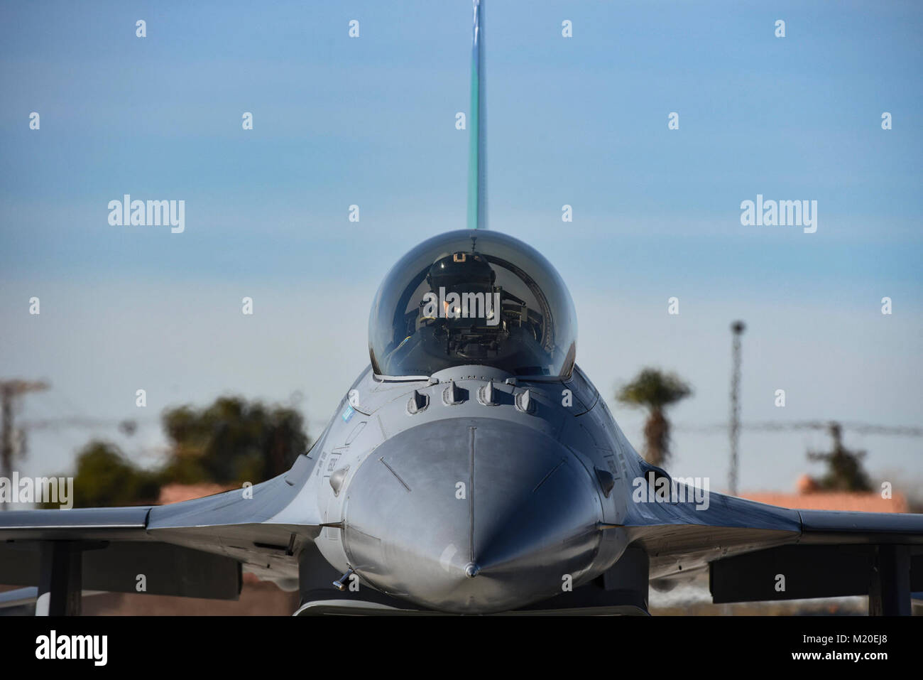 An F-16 Fighting Falcon fighter jet assigned to the 158th Fighter Wing ...