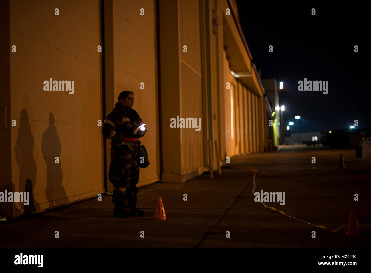 An Airman assigned to the 60th Air Mobility Wing conducts a post ...