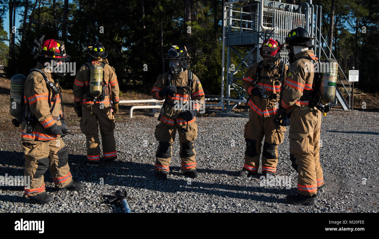 Firefighters with the 1st Special Operations Civil Engineer Squadron ...