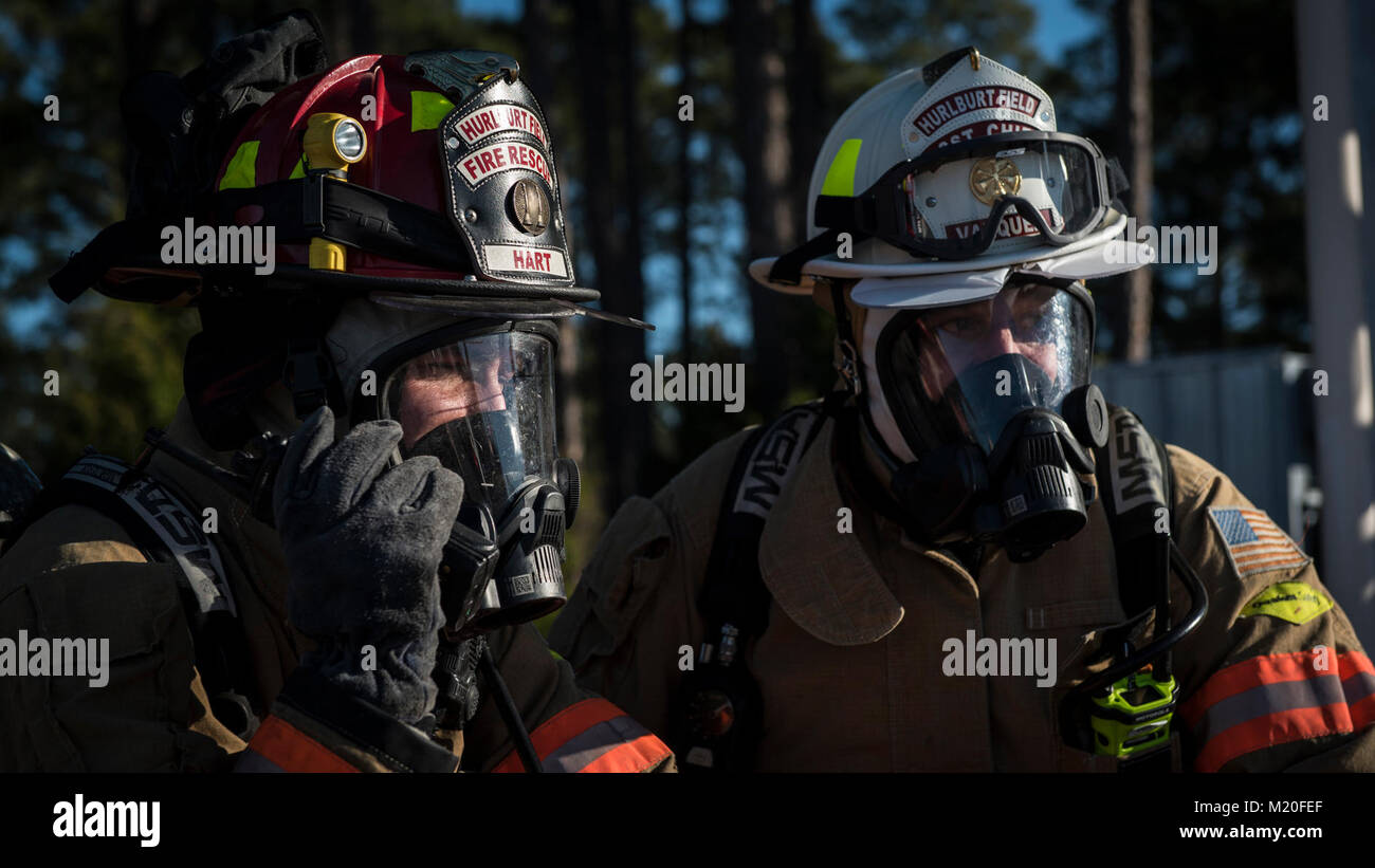 Firefighters with the 1st Special Operations Civil Engineer Squadron ...