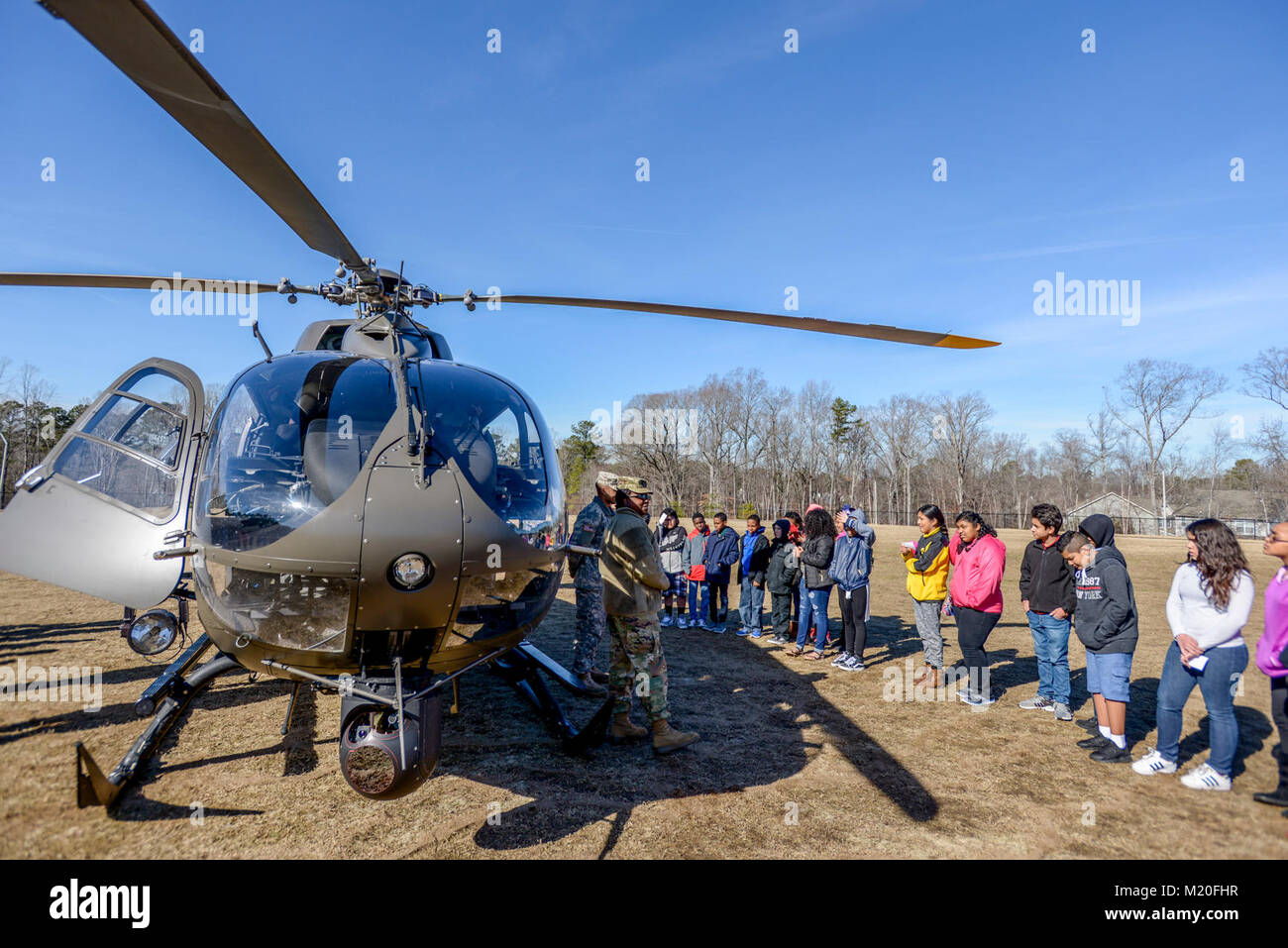 Soldiers with the 449th Theater Aviation Brigade, answer questions from ...
