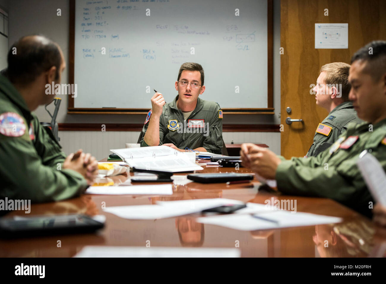 Aircrew members assigned to the 22nd Airlift Squadron perform a flight ...