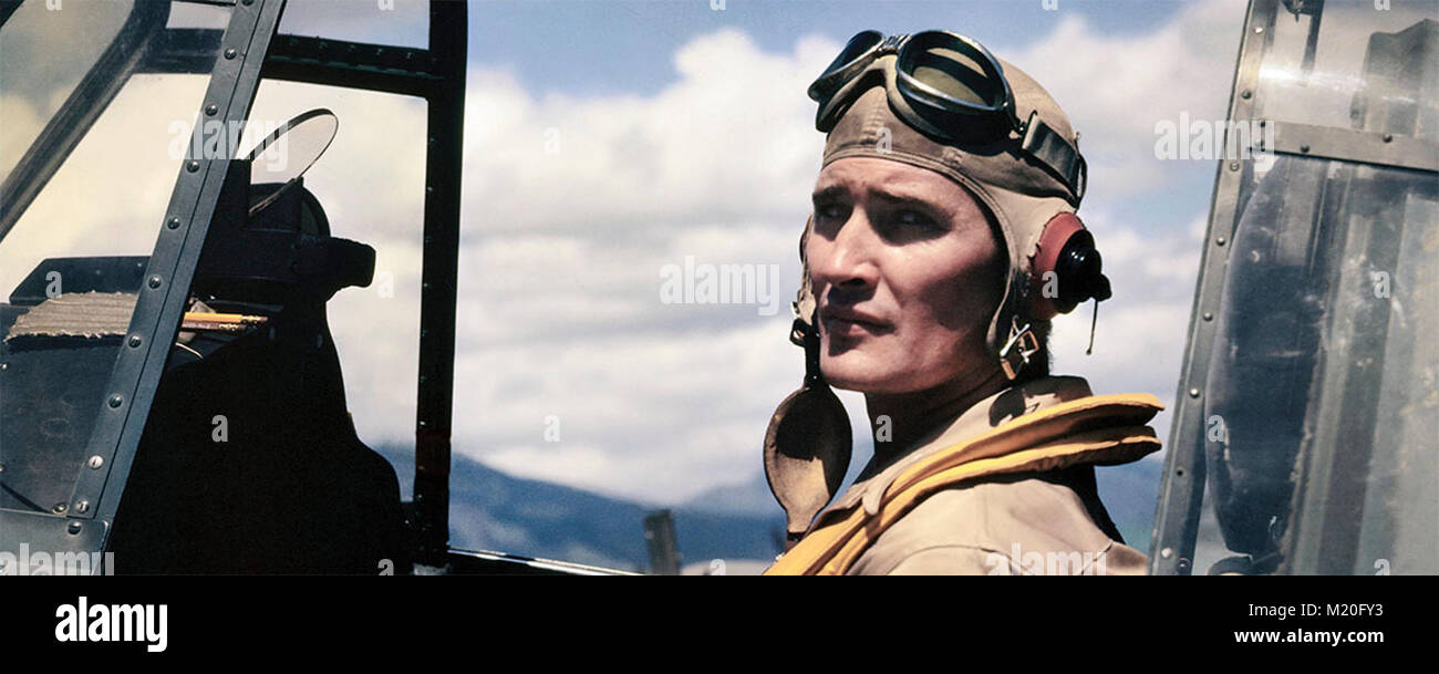 Captain Joseph J. Foss peers from the cockpit of a Grumman F4F-4 ...