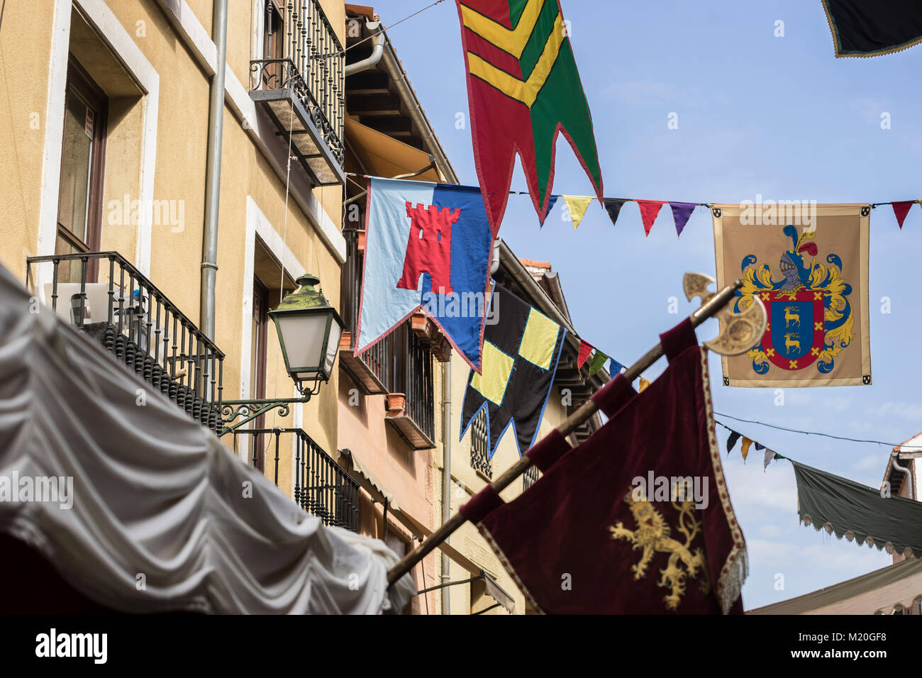 Flags, traditional medieval festival in the streets of Alcala de ...
