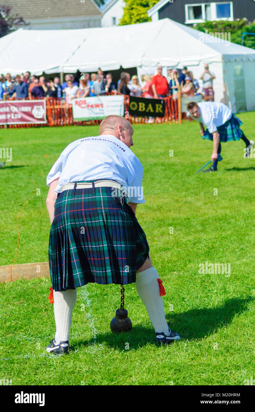 Male prepares to compete in the weight throw competition at the ...