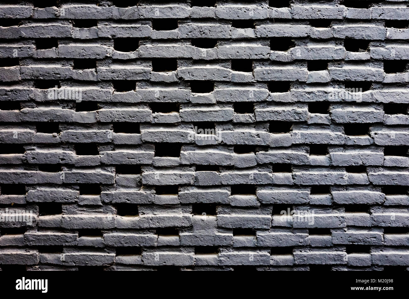 Brick in black colour work wall pattern, craftmanship in construction ...