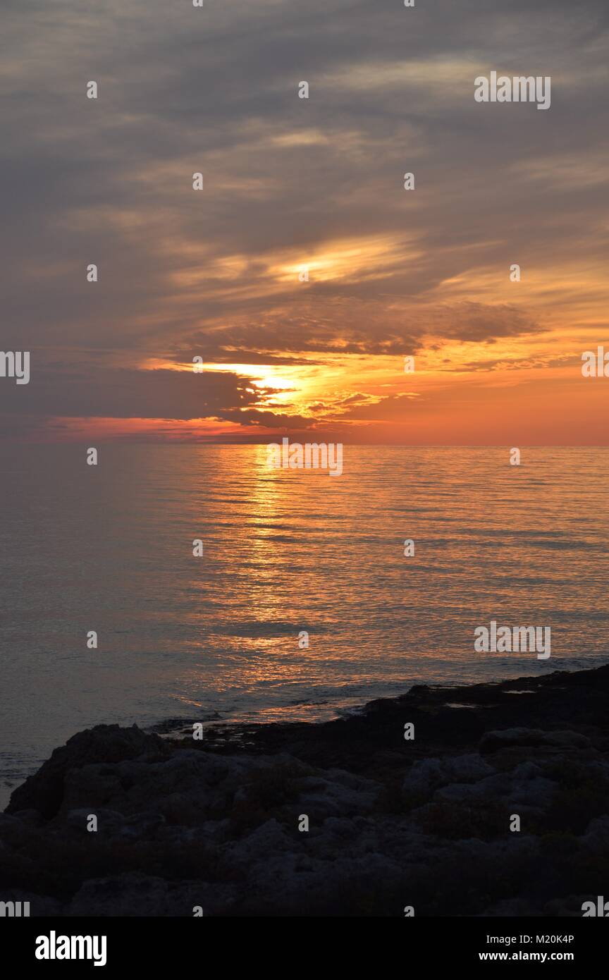Golden sunset along Paphos seashore in Cyprus during November Stock ...