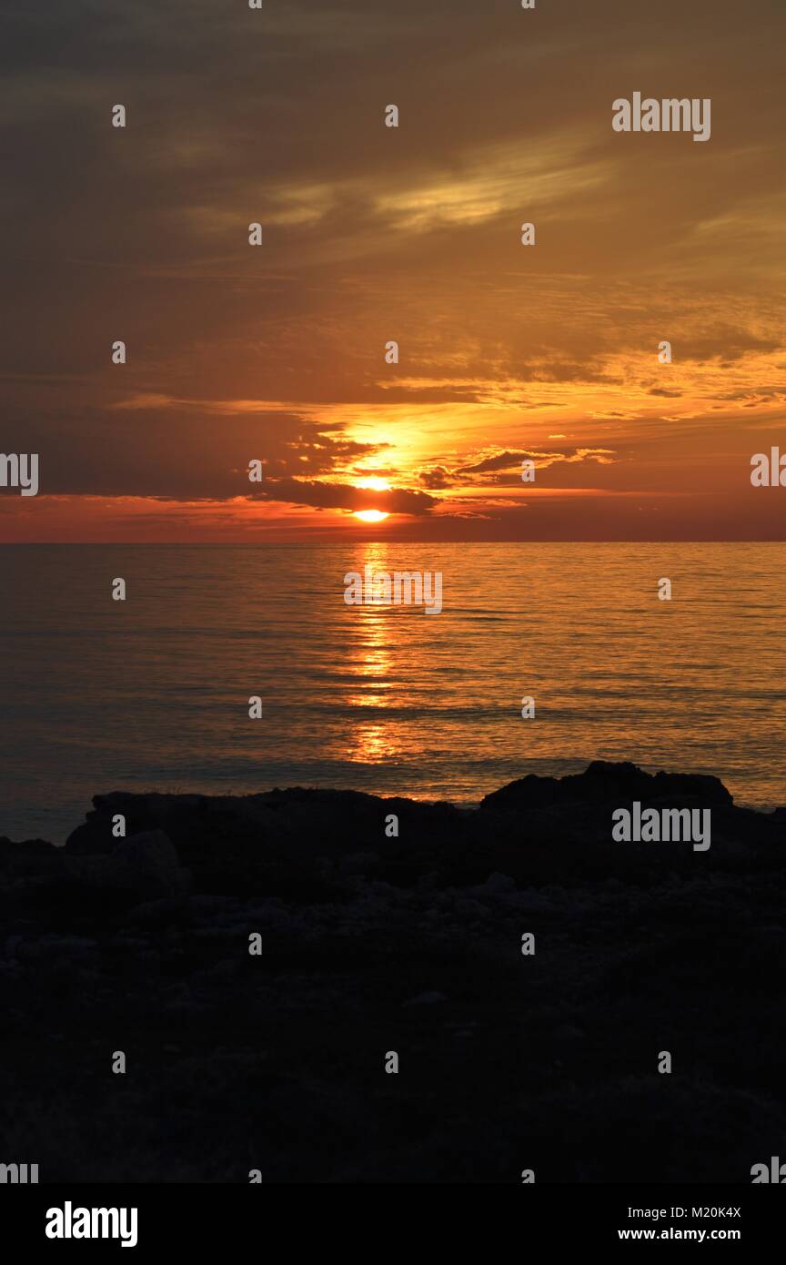 Golden sunset along Paphos seashore in Cyprus during November Stock ...