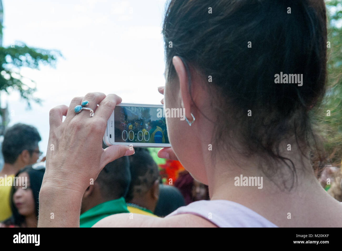 Woman taking digital photos Stock Photo - Alamy
