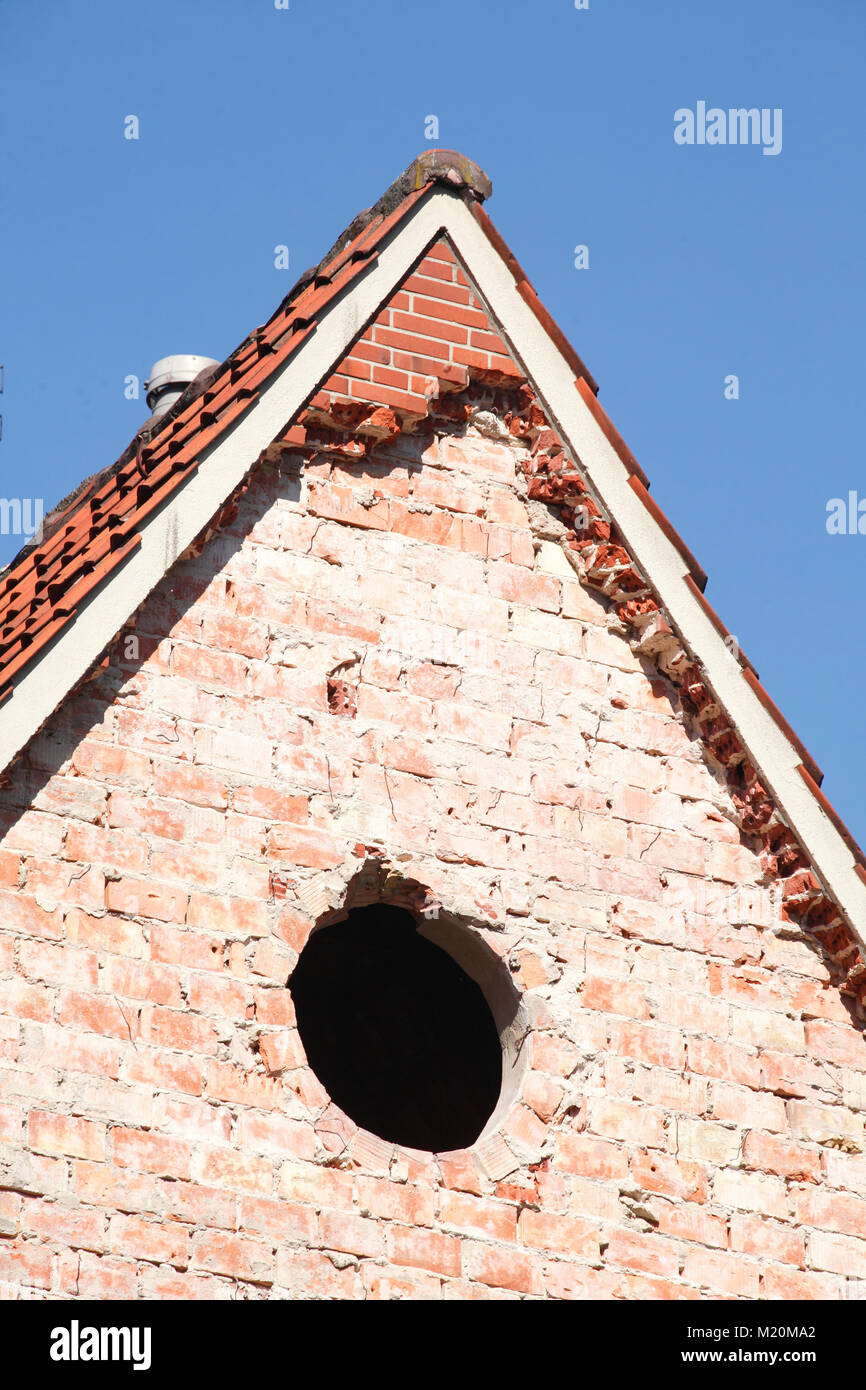 Old House roof gable with Windows from brick Stock Photo - Alamy