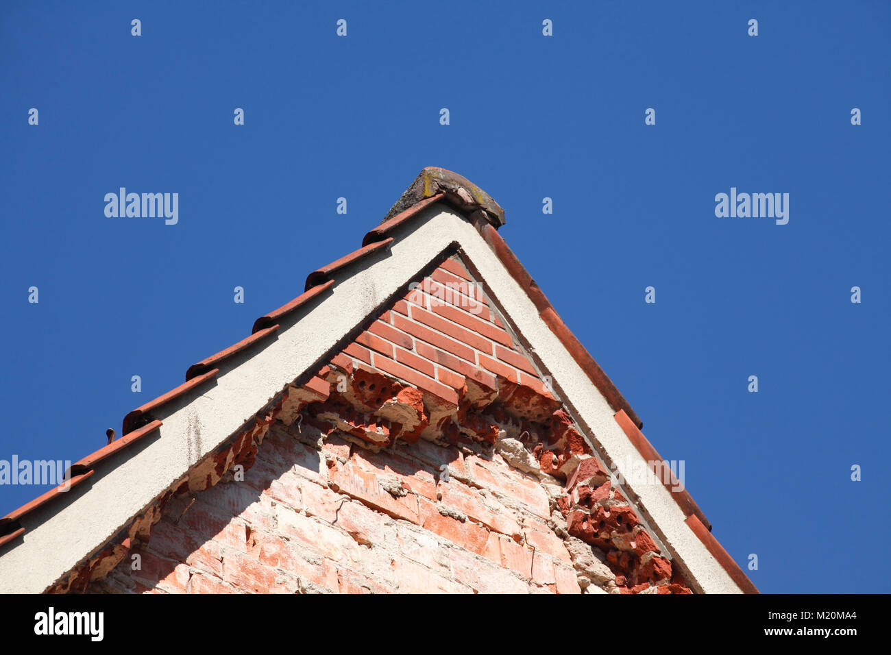 Old House roof gable with Windows from brick Stock Photo - Alamy