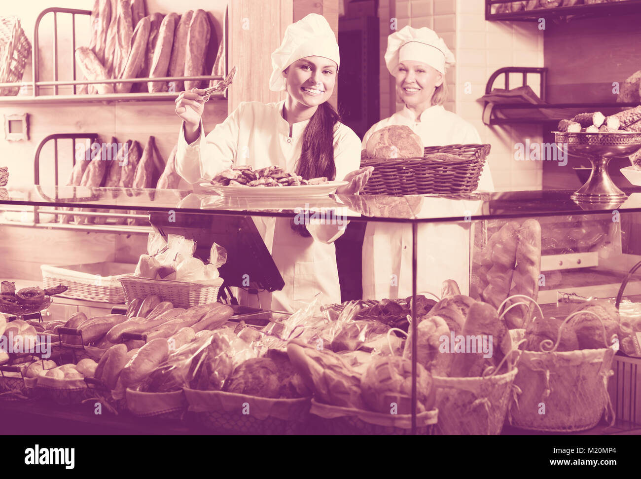 Two female bakers work hi-res stock photography and images - Alamy