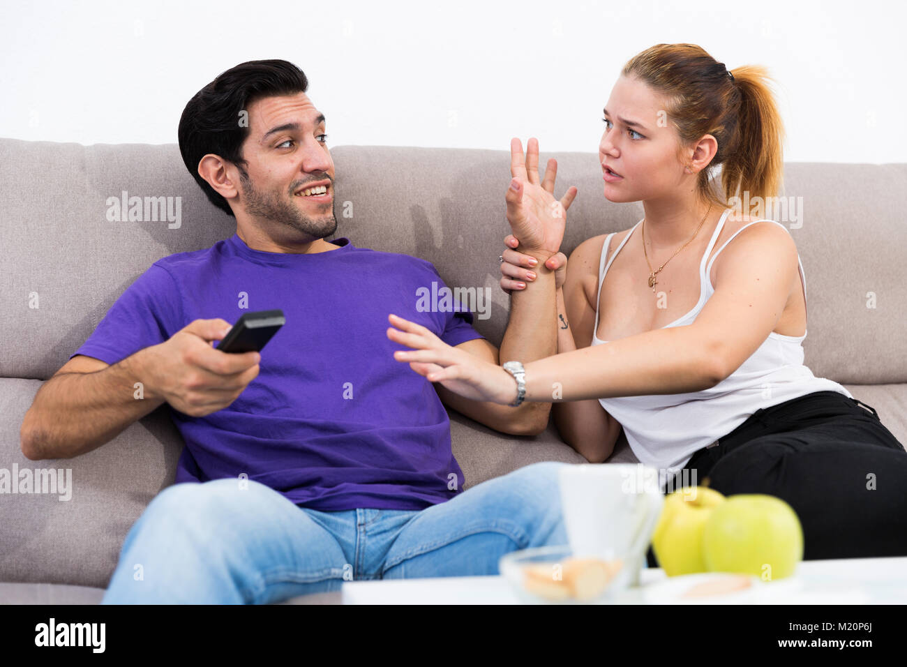 Couple arguing home tv hi-res stock photography and images - Alamy